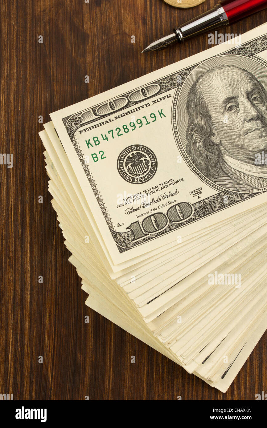 dollars money banknotes on wooden background Stock Photo - Alamy
