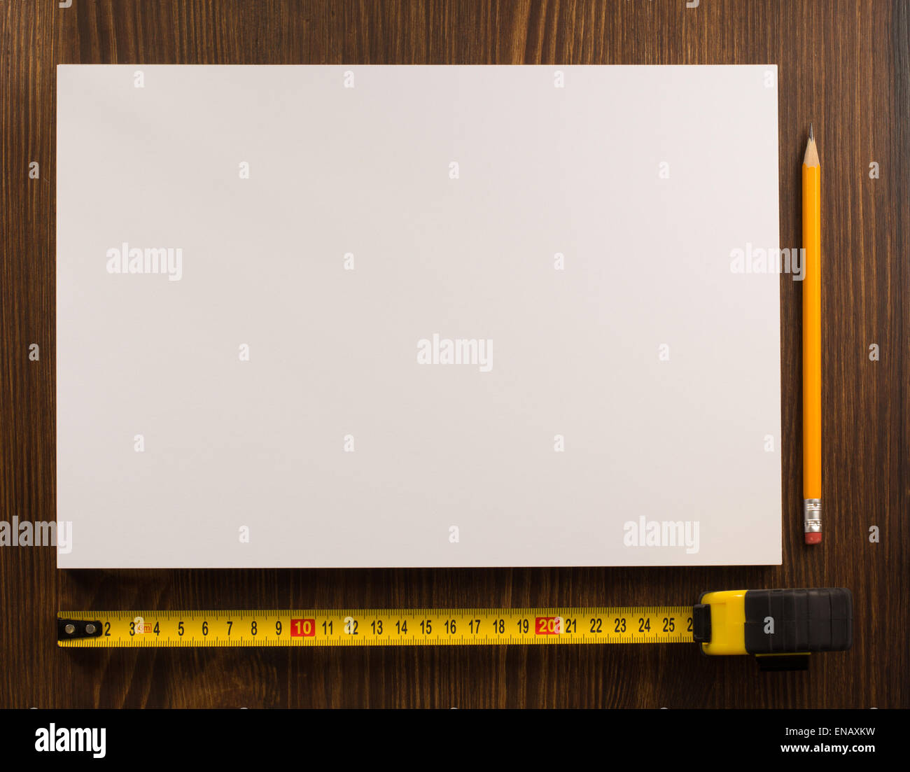 tape measure and pencil on wooden texture Stock Photo - Alamy