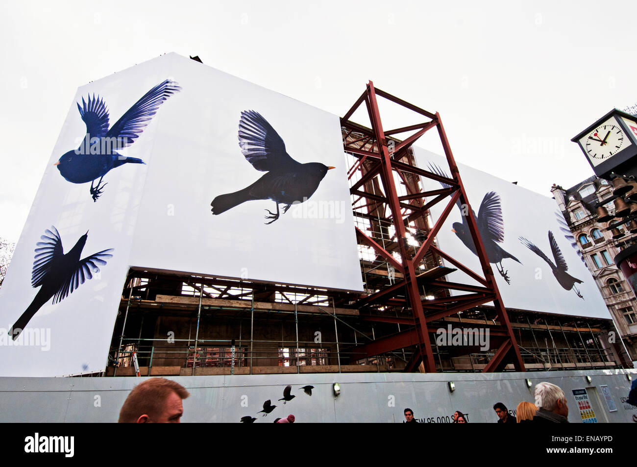 Decorative scaffolding screens Construction site hoarding Stock Photo ...