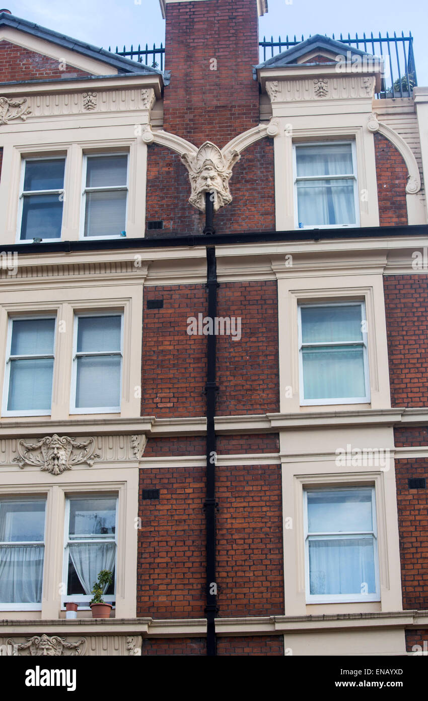 Ornate gargoyle drainpipe rainwater channel gutter Stock Photo - Alamy
