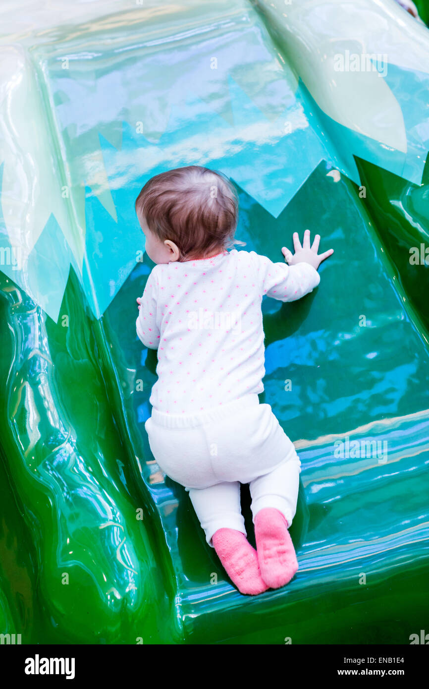 Toddler playing at the indoor toddler playground Stock Photo - Alamy