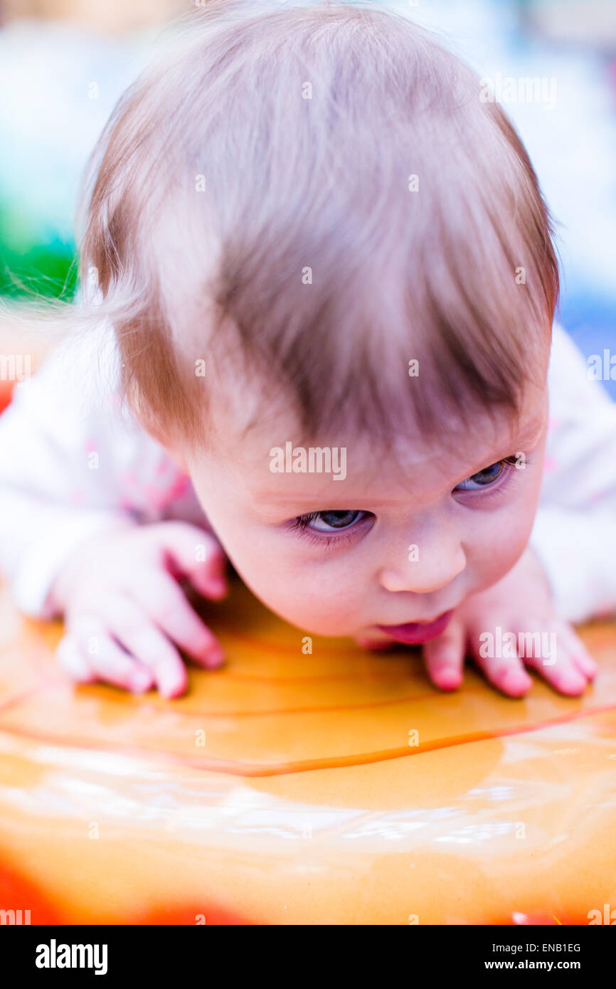 Toddler playing at the indoor toddler playground Stock Photo - Alamy