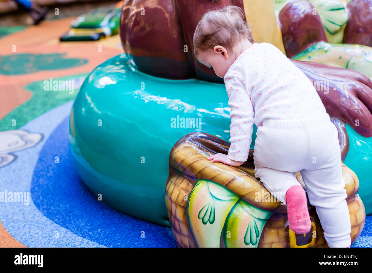 Toddler playing at the indoor toddler playground Stock Photo - Alamy