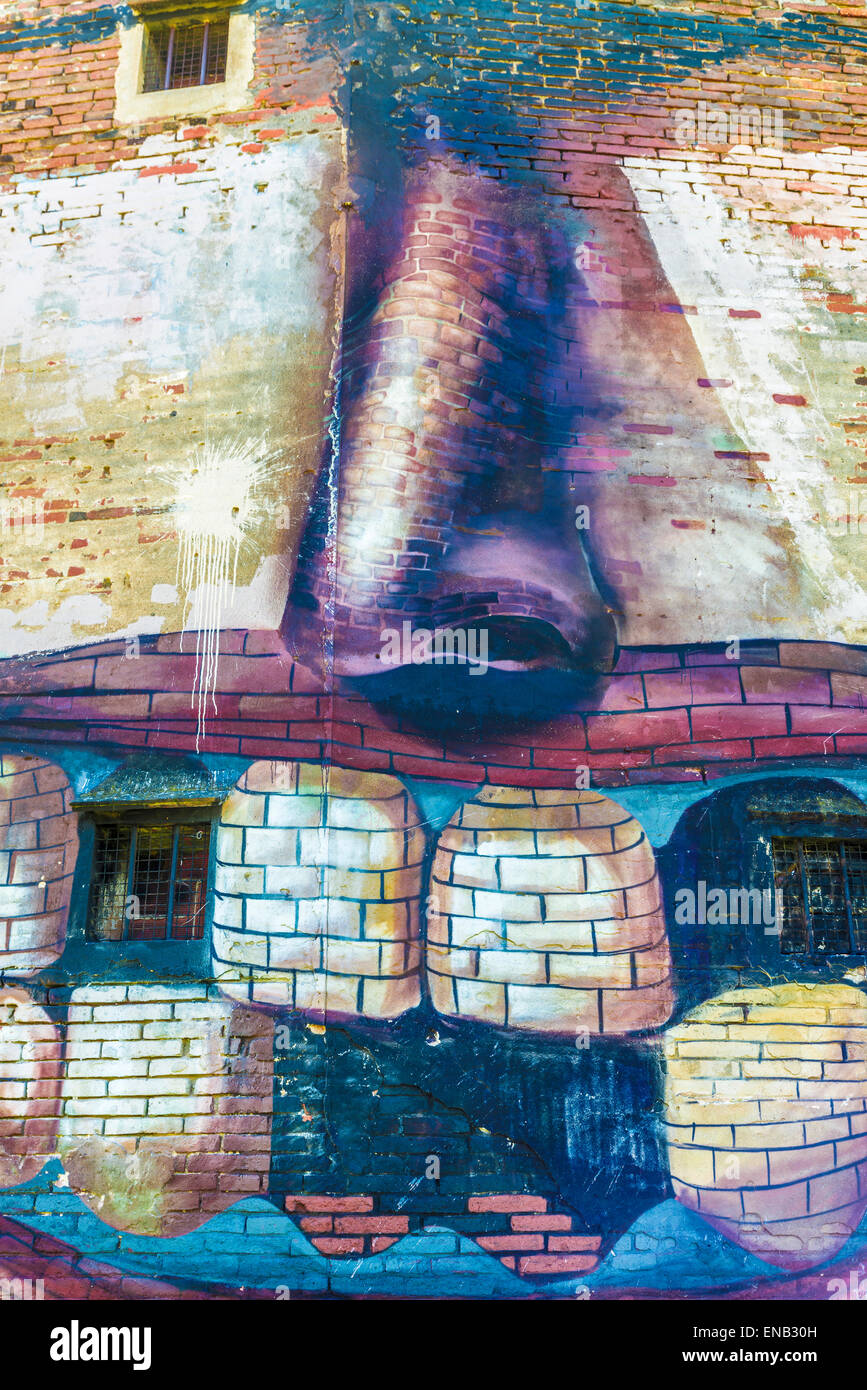 Wall covered with graffiti as a human face Stock Photo - Alamy