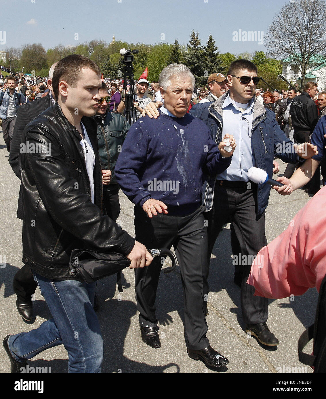 Kiev, Ukraine. 1st May, 2015. Bodyguards escort Petro Symonenko (C ...