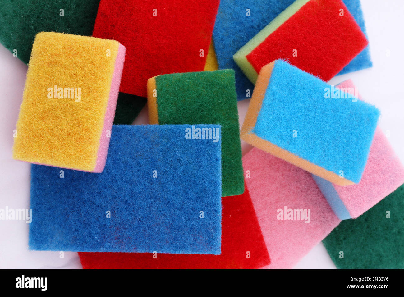 A lot of sponges in different colors background Stock Photo - Alamy