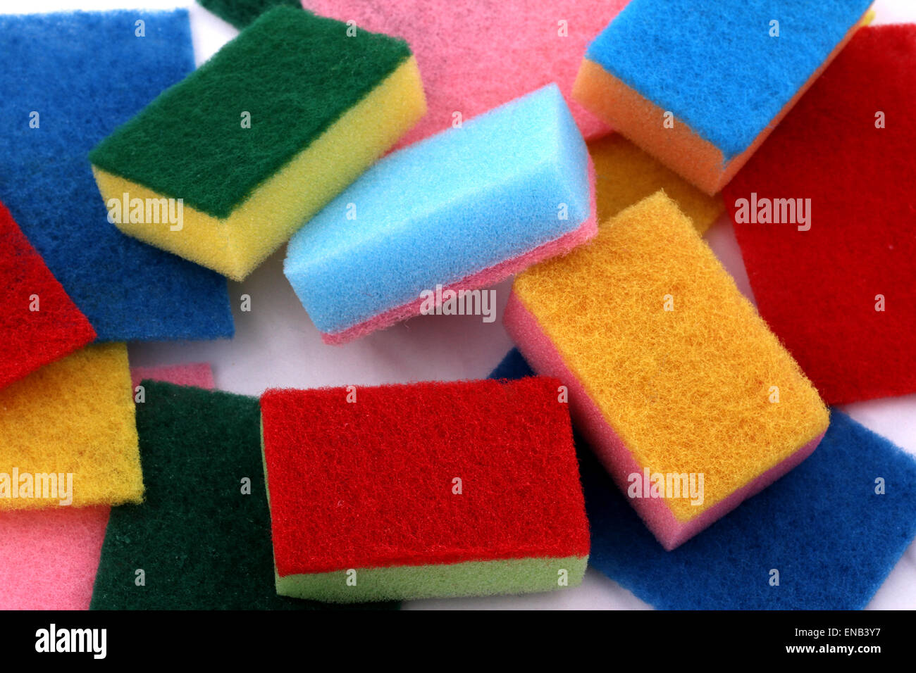 A lot of sponges in different colors background Stock Photo - Alamy