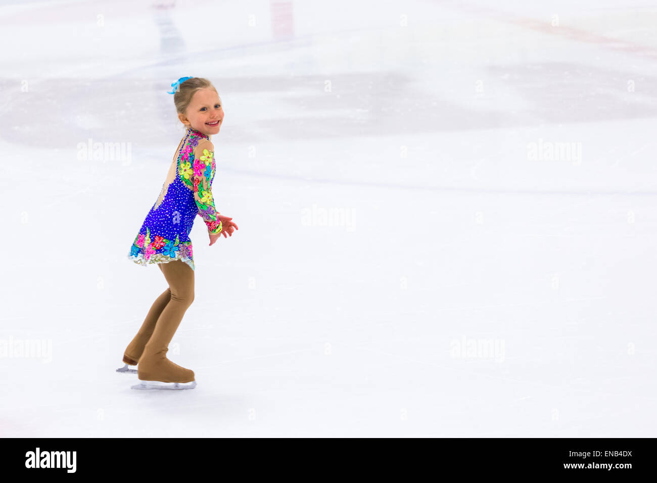 Young figure skater practicing at indoor skating rink Stock Photo - Alamy