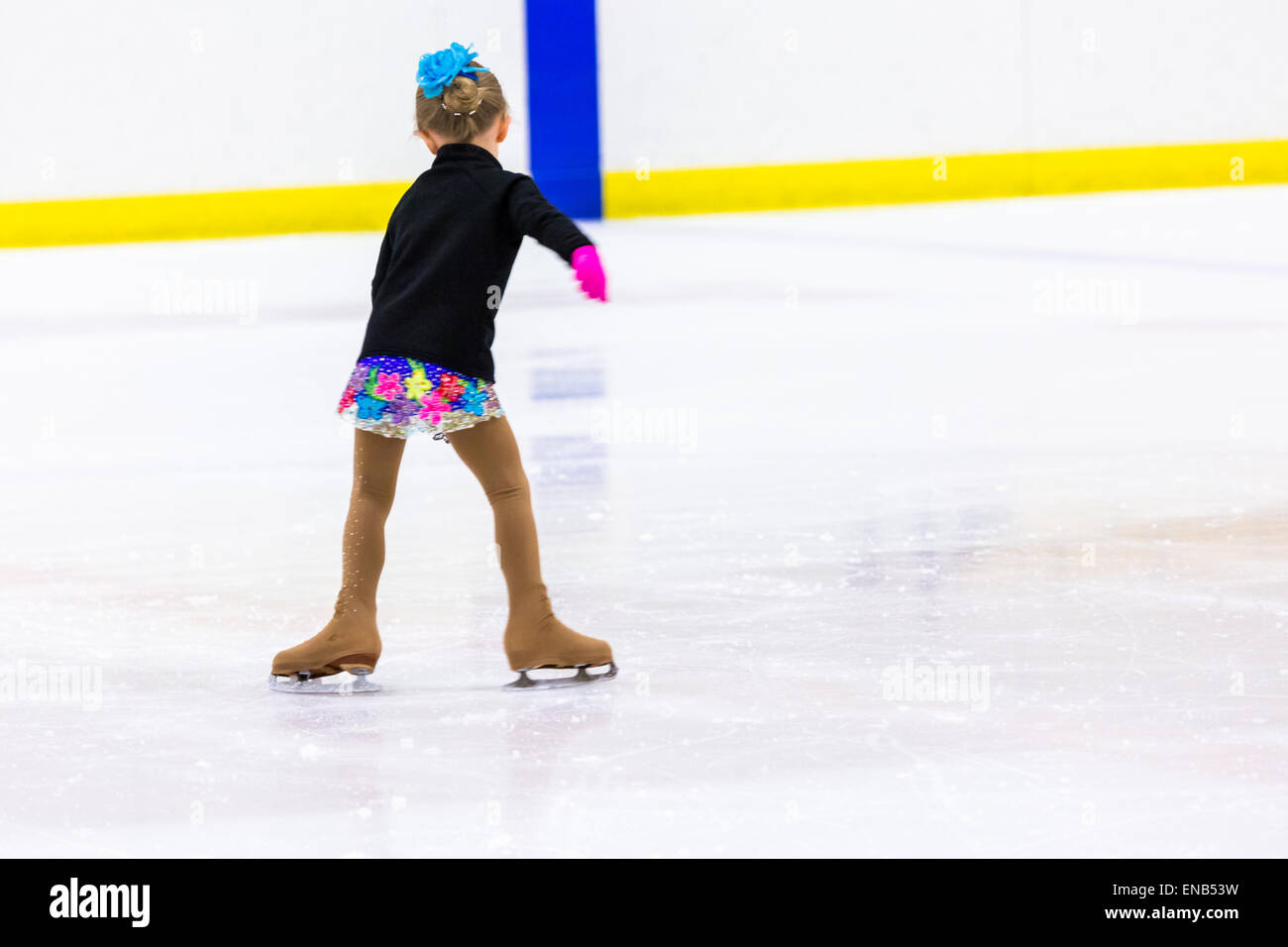 Young figure skater practicing at indoor skating rink Stock Photo - Alamy