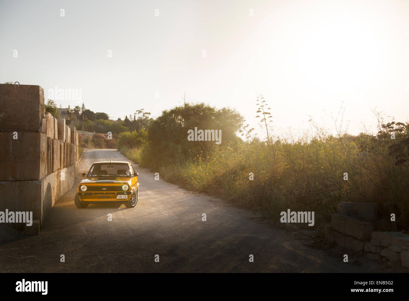 MKI Ford Fiesta in Malta with the sun highlighting it against a block ...