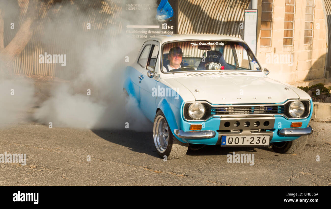 Ford MKI Escort in Malta with a Cosworth engine performing a burnout by ...