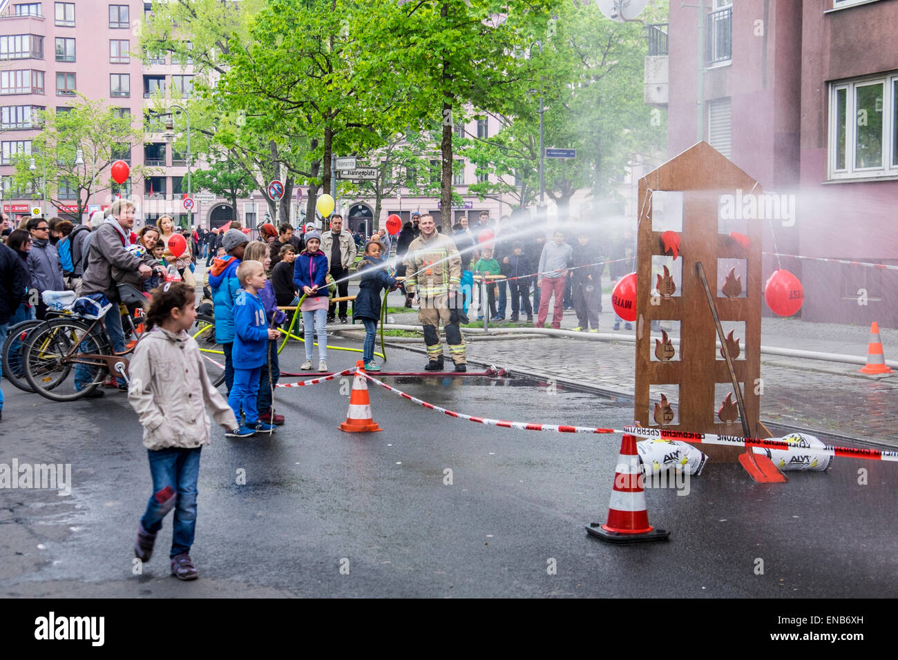 Children play fire hose public hi-res stock photography and images - Alamy