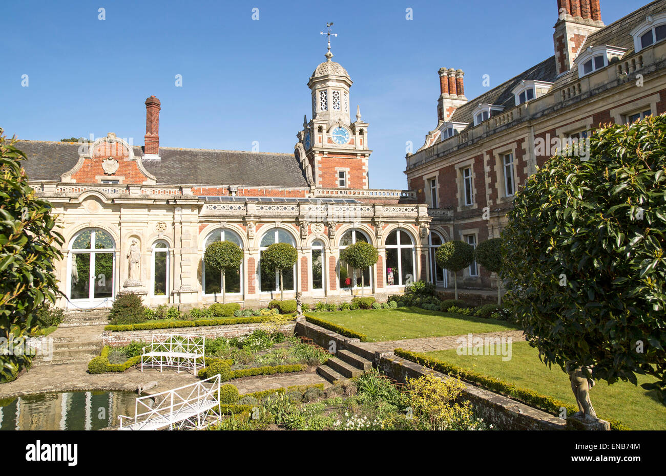 The White Garden and clock tower at Somerleyton Hall country house ...
