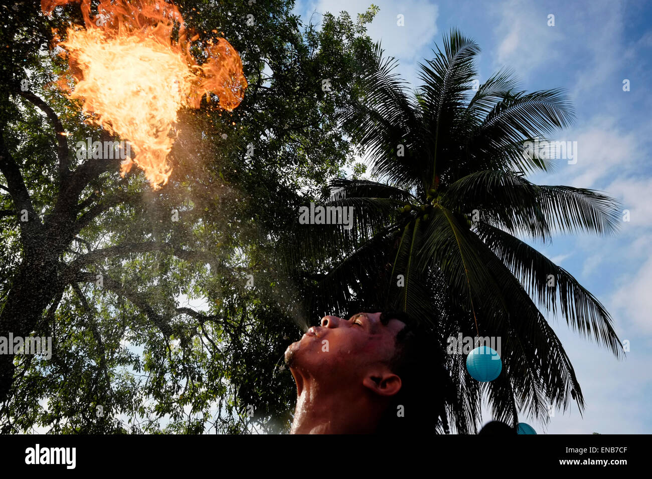 Fire eater spit fire at the 'Carnaval International de Victoria' (Now ...