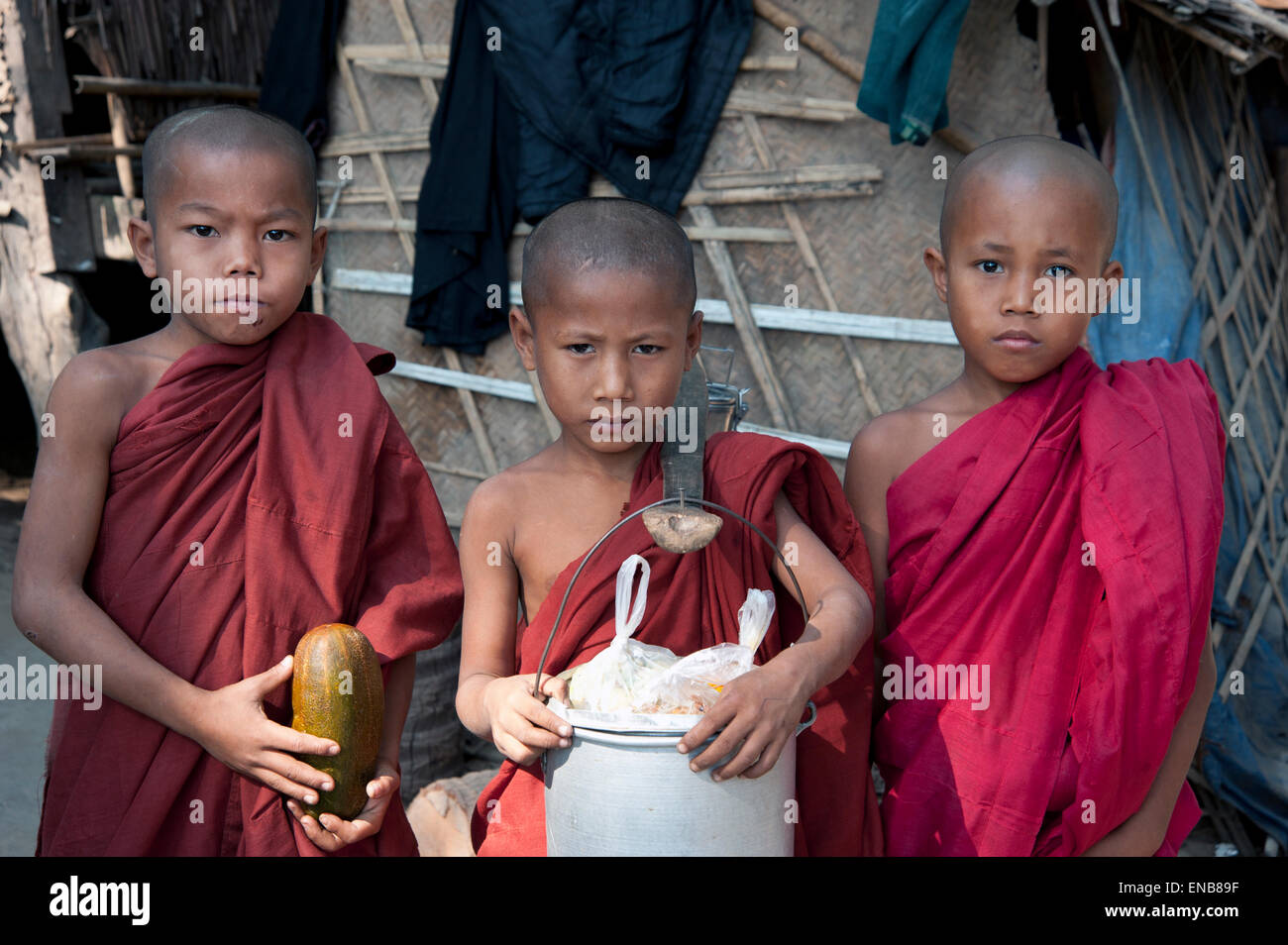 Boy standing in front house hi-res stock photography and images - Alamy