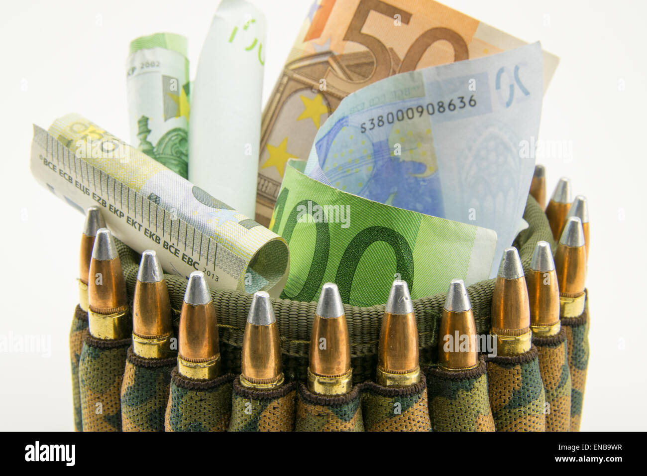 composition with bullets and banknotes Stock Photo - Alamy