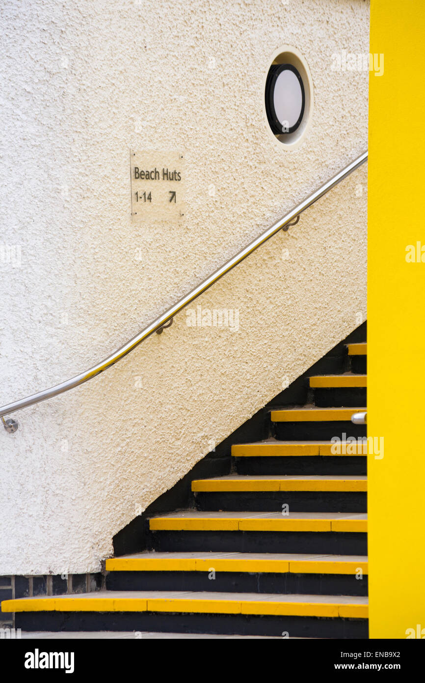 Yellow steps with sign leading up to beach huts 1-14 - new colourful ...