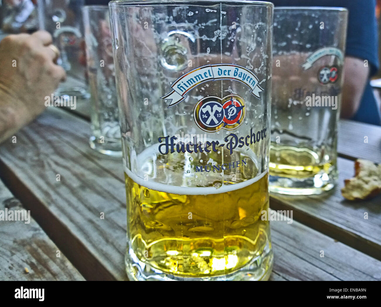 Relax drinking beer in an open air restaurant (Biergarten) typical of ...