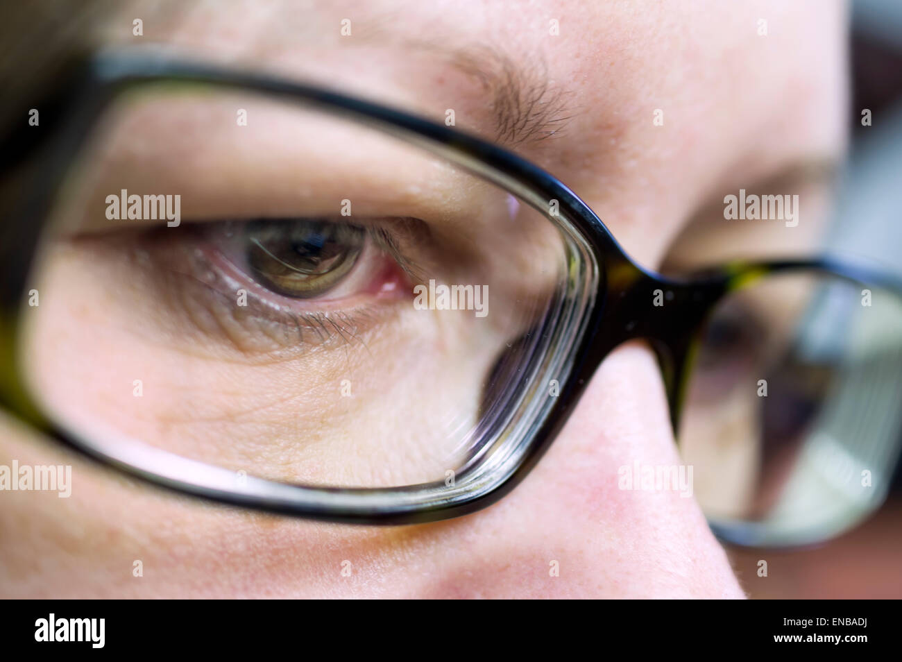 Female eyes wearing glasses Stock Photo - Alamy