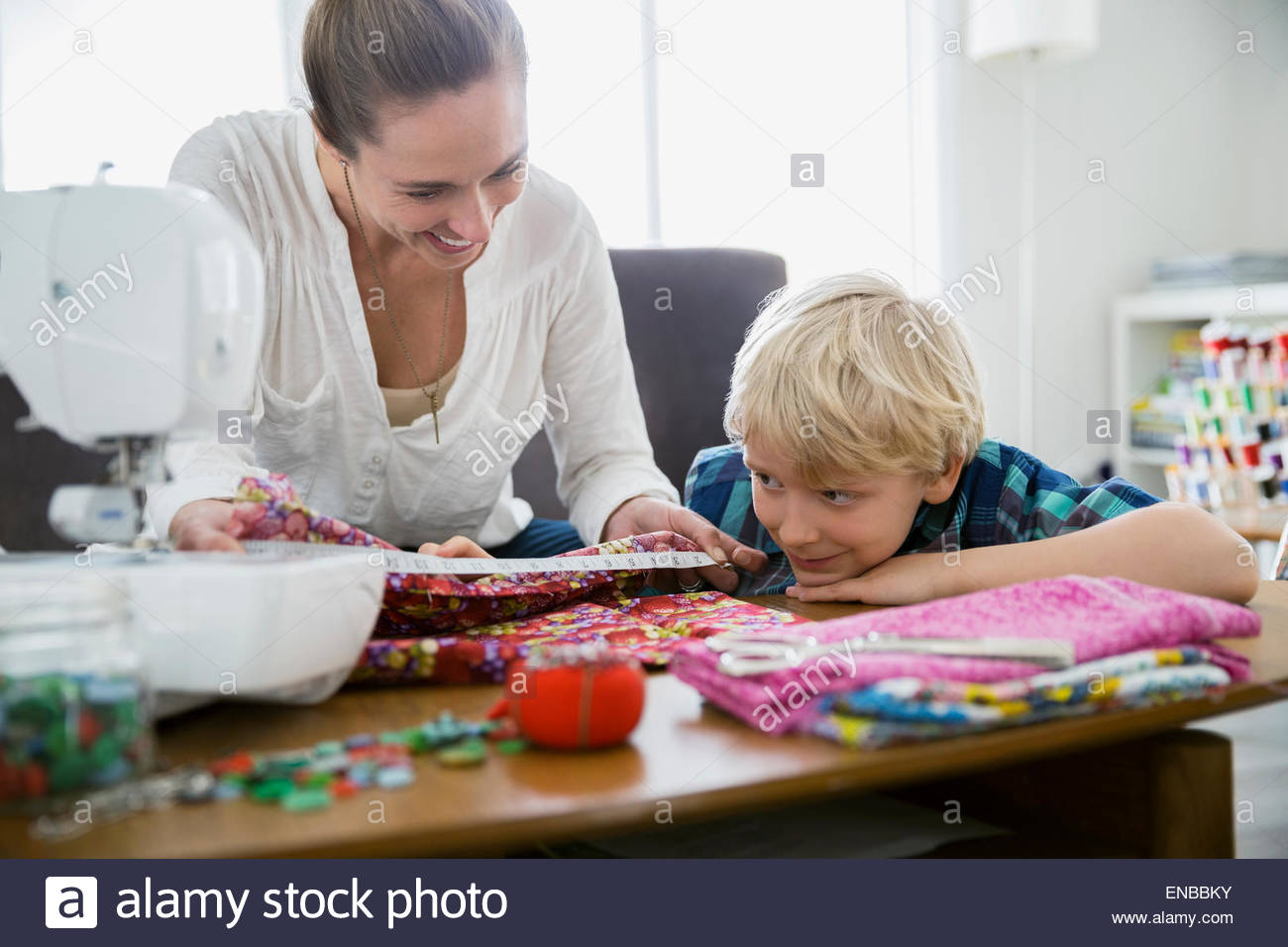 Two women sewing together hi-res stock photography and images - Alamy