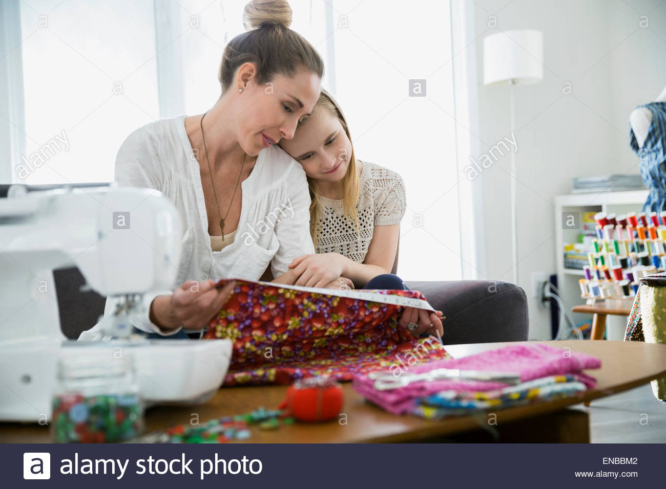 Two women sewing together hi-res stock photography and images - Alamy