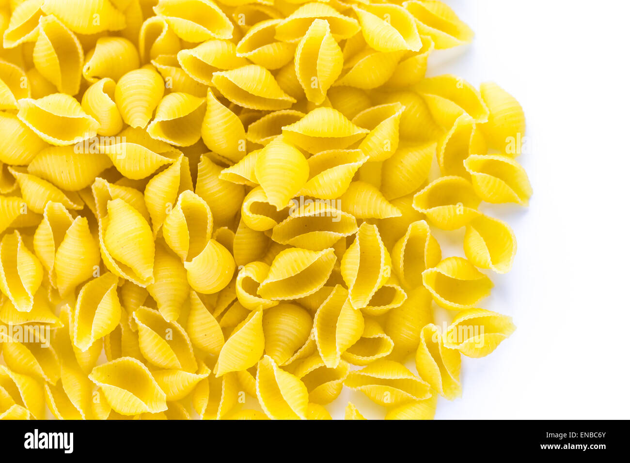 Organic dry pasta on a white background Stock Photo - Alamy