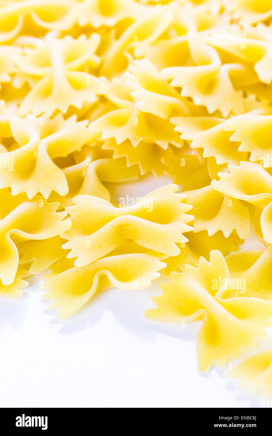 Organic dry pasta on a white background Stock Photo - Alamy