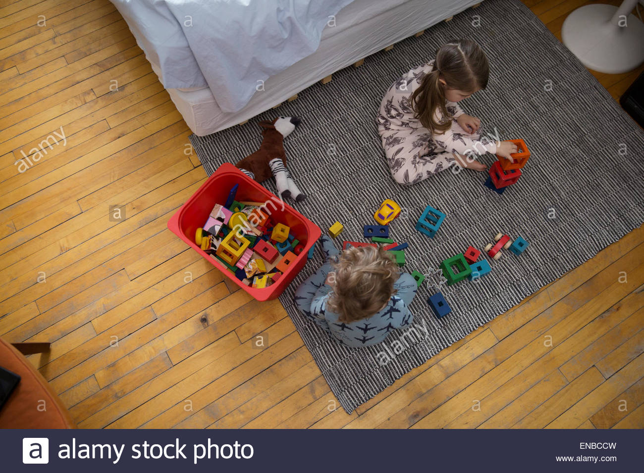 Children playing on the floor hi-res stock photography and images - Alamy