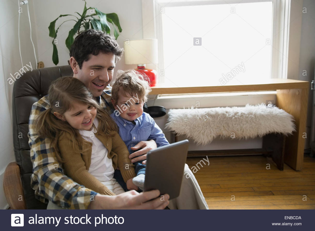 Father watching his children hi-res stock photography and images - Alamy