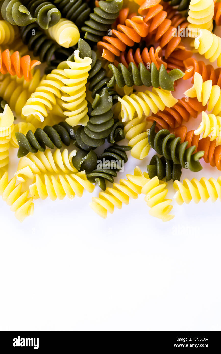 Organic dry pasta on a white background Stock Photo - Alamy