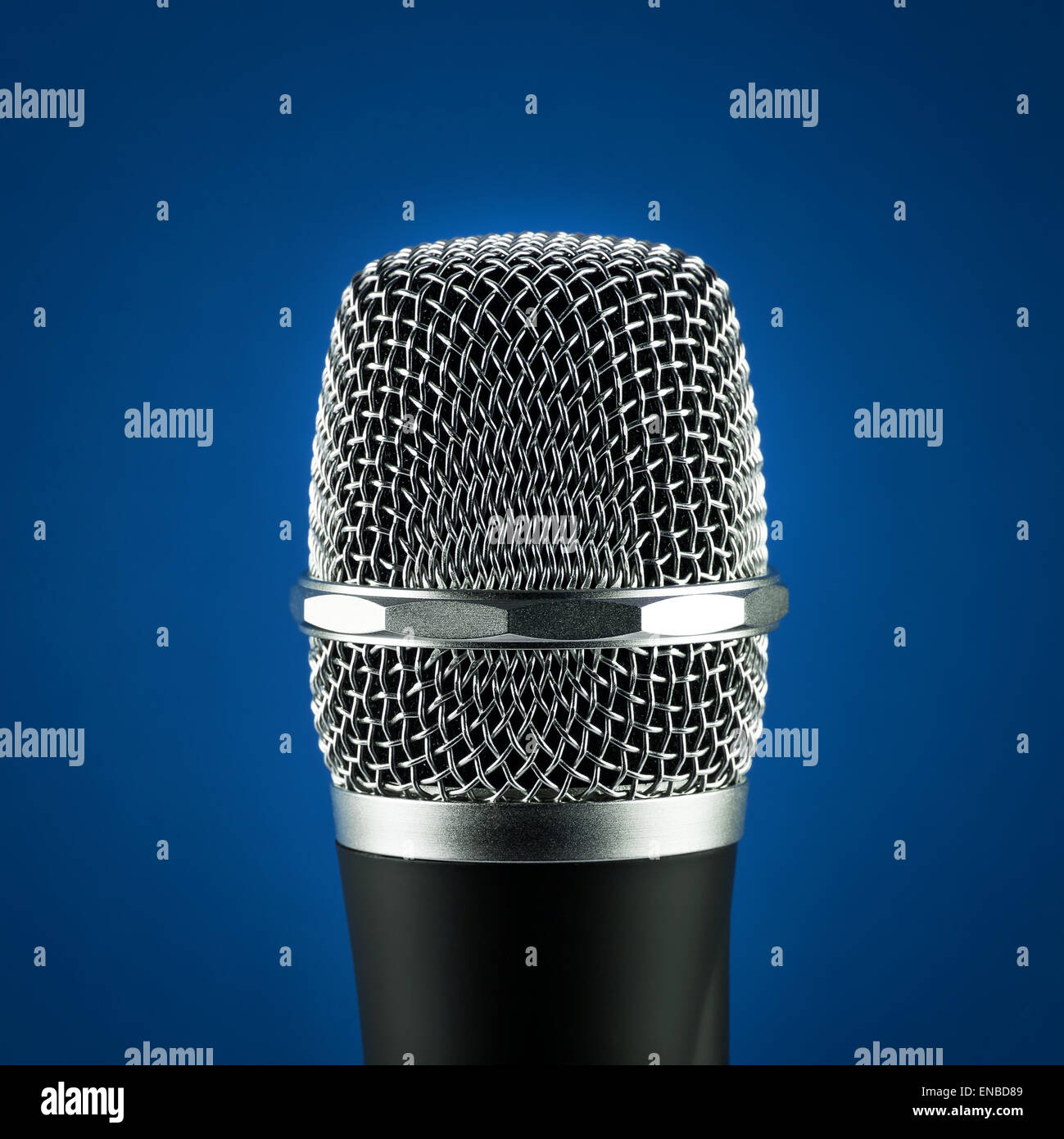 Wireless microphone closeup on blue background Stock Photo - Alamy