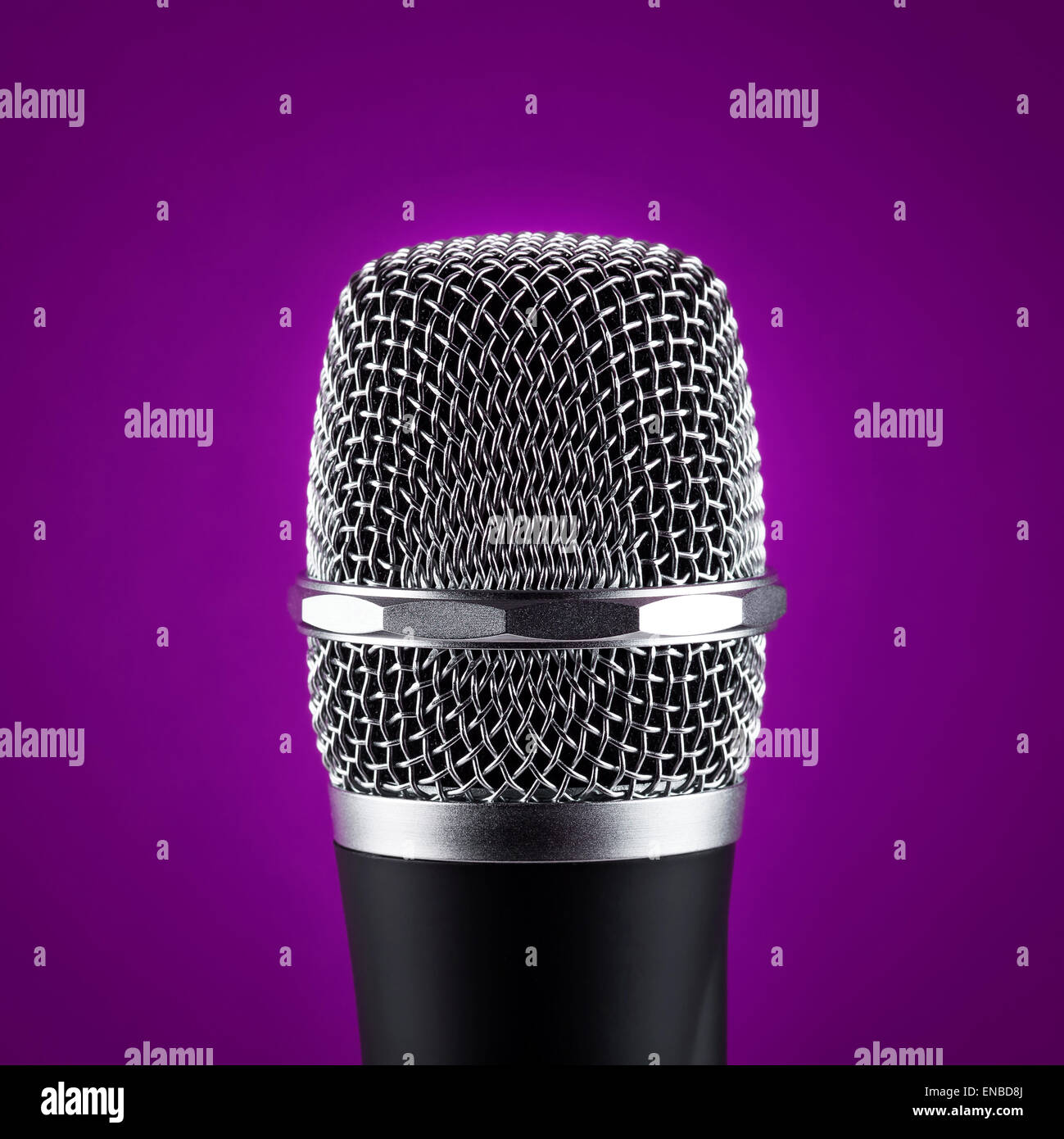 Wireless microphone closeup on purple background Stock Photo - Alamy