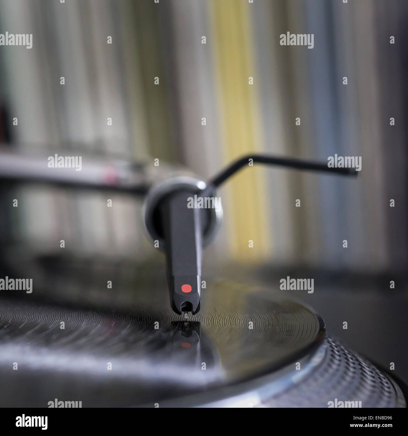 Dj needle stylus on spinning record, vinyl background Stock Photo - Alamy