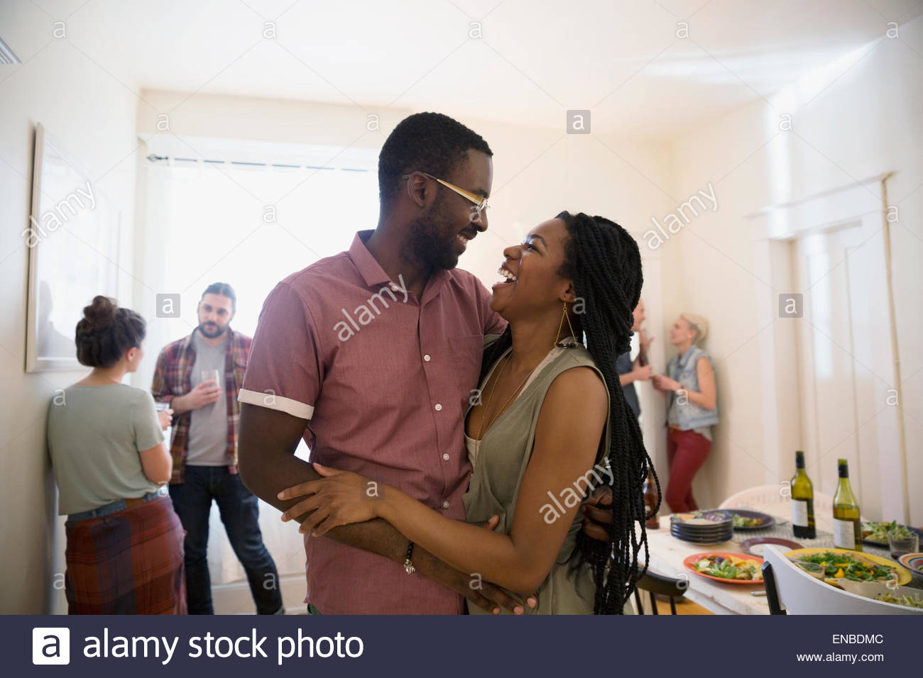 Couple hugging party hi-res stock photography and images - Alamy