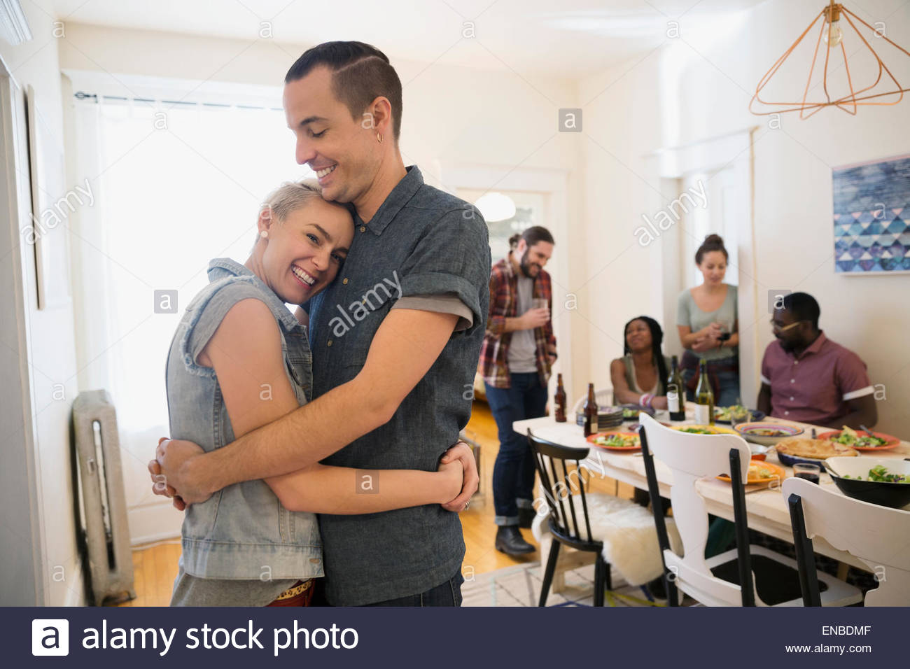 Couple hugging party hi-res stock photography and images - Alamy