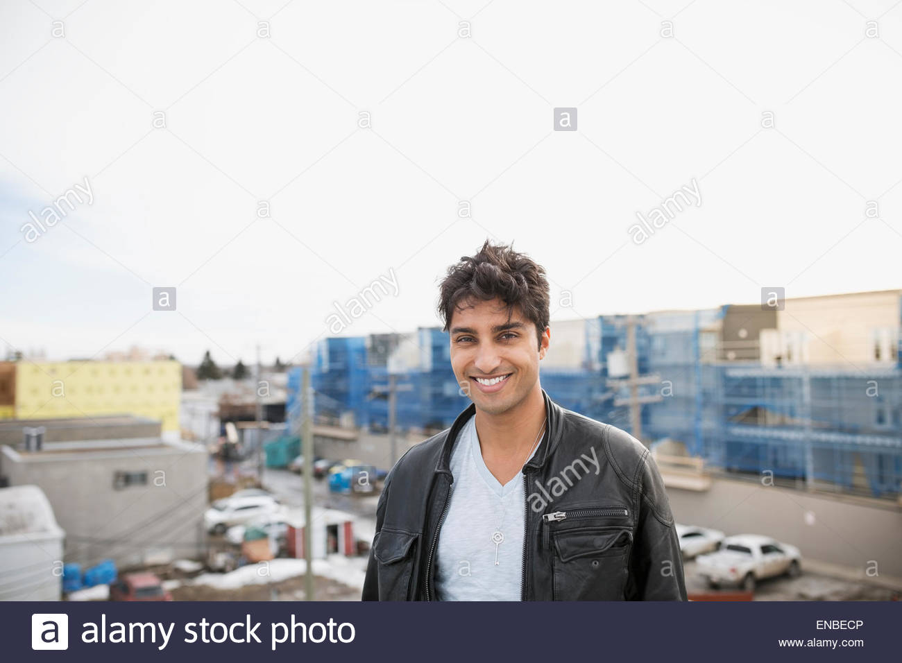 Man on rooftop hi-res stock photography and images - Alamy