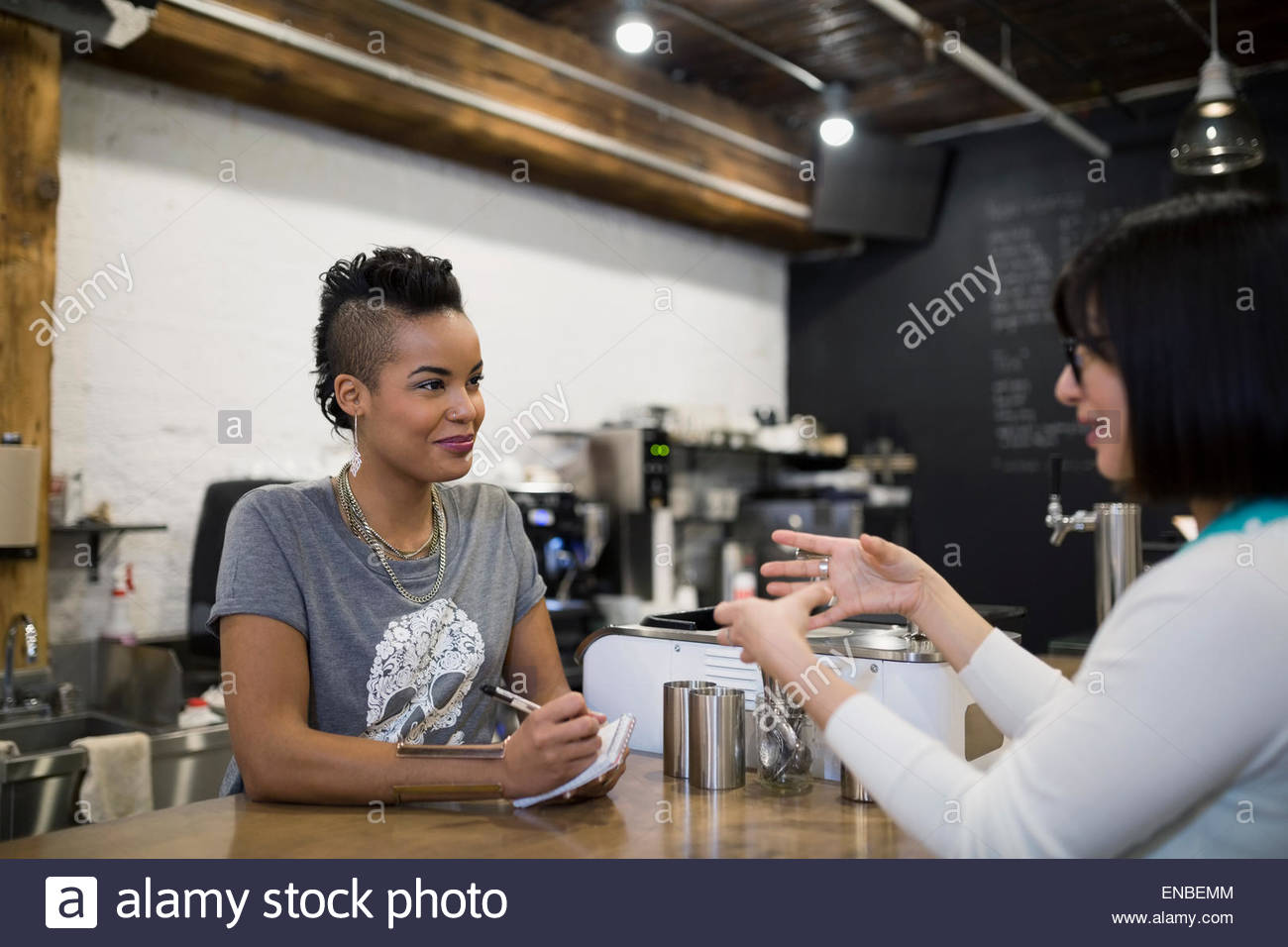 Ordering coffee counter barista hi-res stock photography and images - Alamy