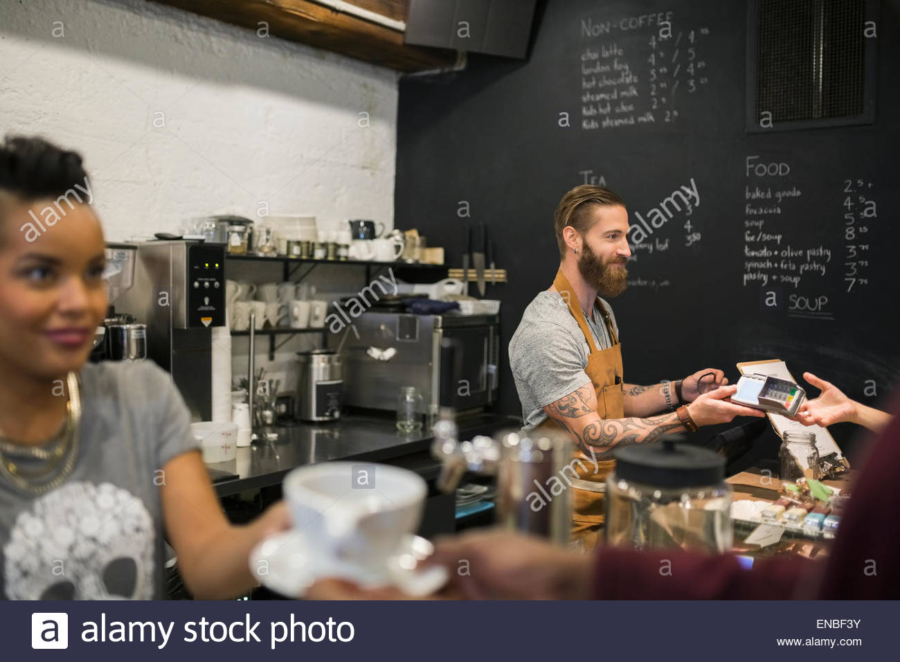 Barista Serving Coffee Stock Photos & Barista Serving Coffee Stock ...