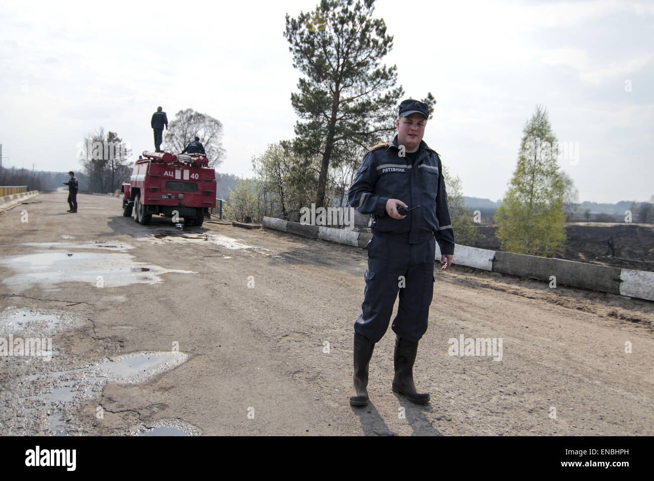 Chernobyl, Ukraine. 1st May, 2015. Ukrainian firemen rest and pump ...