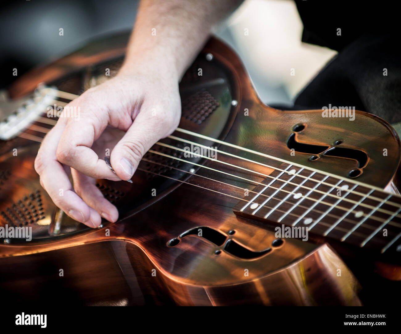 Hands playing guitar Stock Photo - Alamy