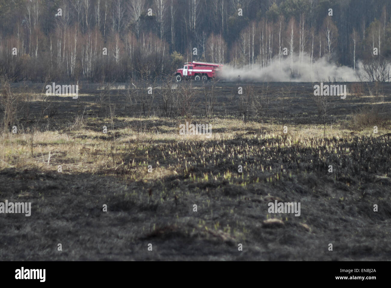 Chernobyl, Ukraine. 1st May, 2015. Ukrainian firemen rest and pump ...