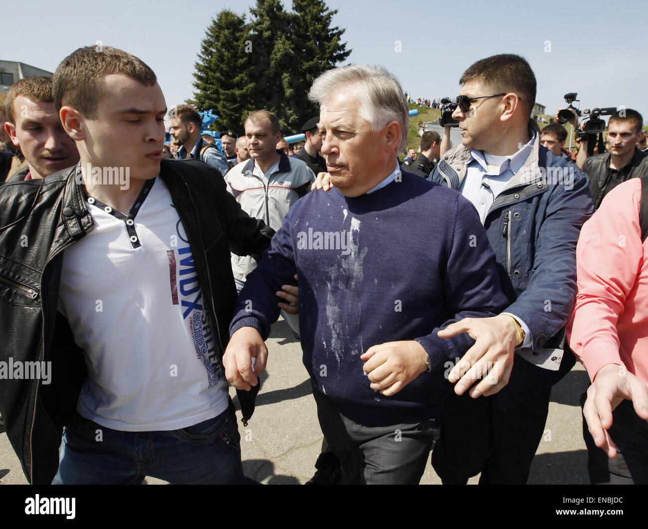 Kiev, Ukraine. 1st May, 2015. Bodyguards escort PETRO SYMONENKO, leader ...