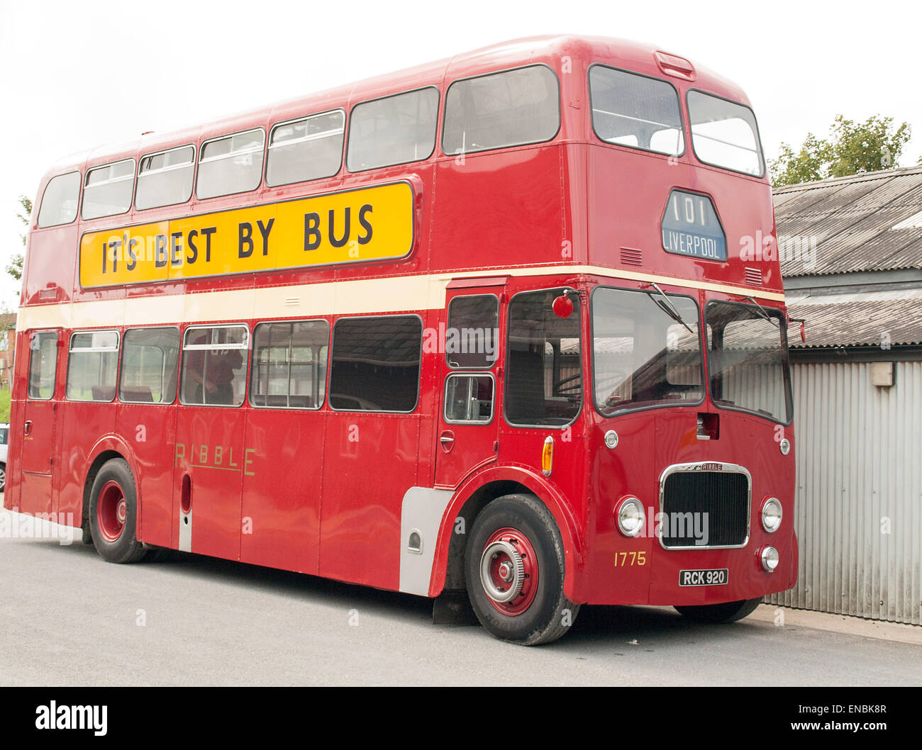 Vintage red bus pulls up for passenger duty and steam and traction show ...