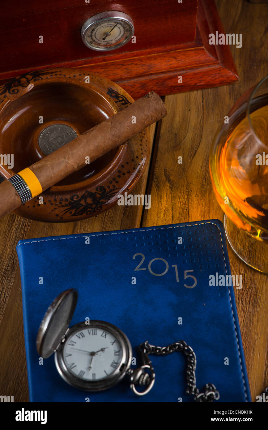 Cuban cigar with items related to travel,business and Cuba Stock Photo ...