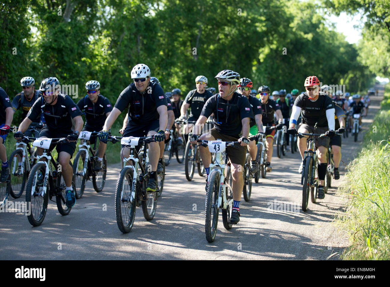 Former Pres.George W. Bush rides with military veterans during the Bush ...