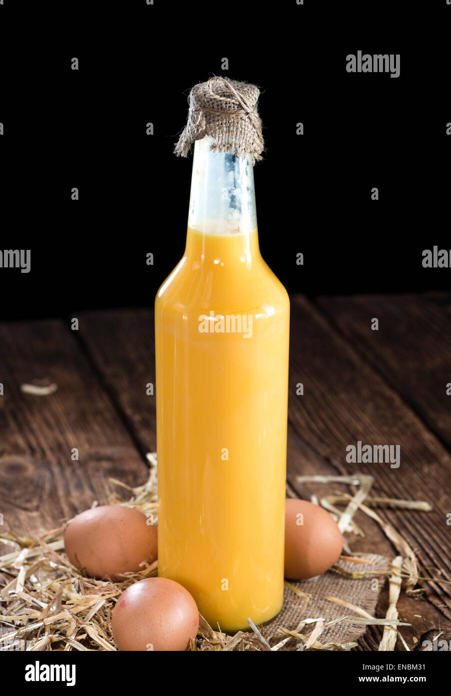 Homemade Egg Liqueur on dark vintage wooden background Stock Photo - Alamy