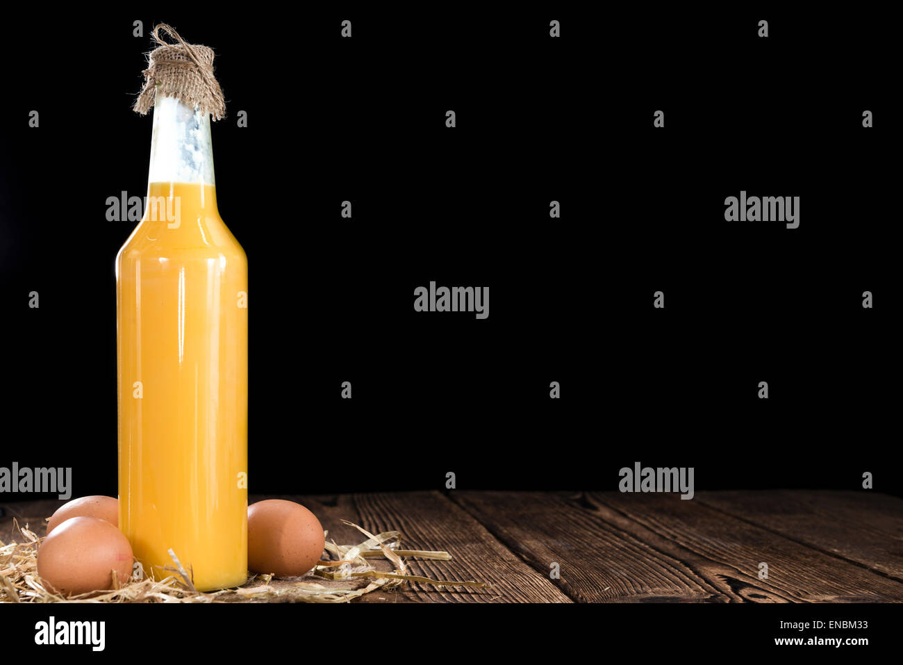 Homemade Egg Liqueur on dark vintage wooden background Stock Photo - Alamy