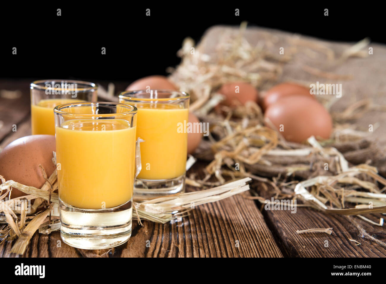 Homemade Egg Liqueur on dark vintage wooden background Stock Photo - Alamy