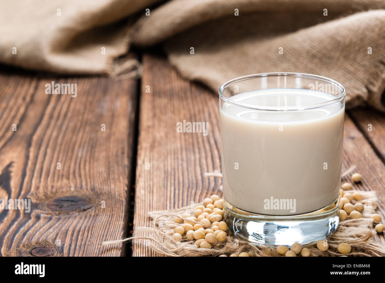 Soy Milk with some Seeds (close-up shot) on wooden background Stock ...