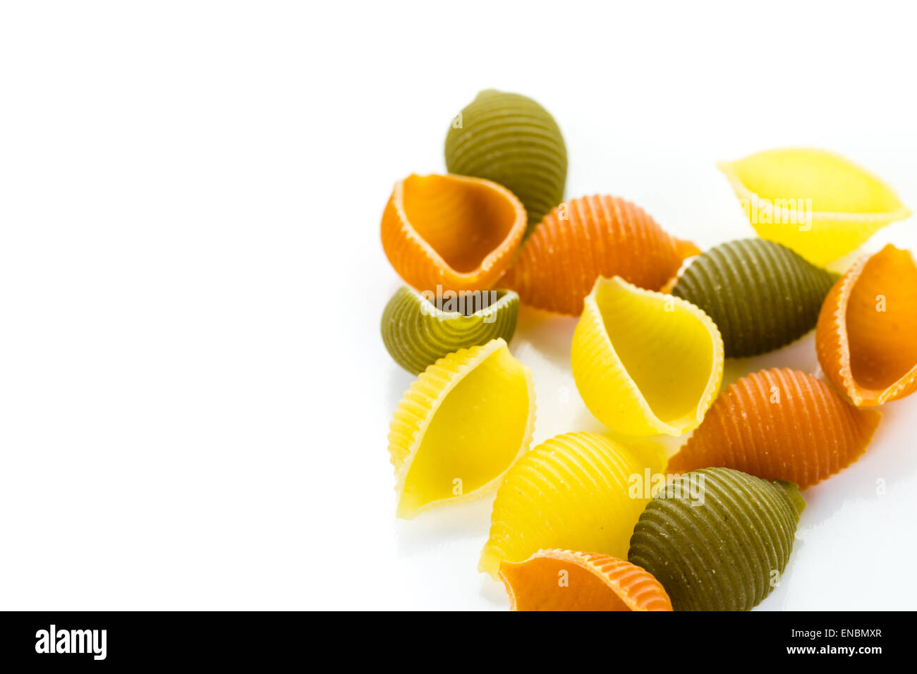 Multicolor shell pasta with tomato and spinach Stock Photo - Alamy